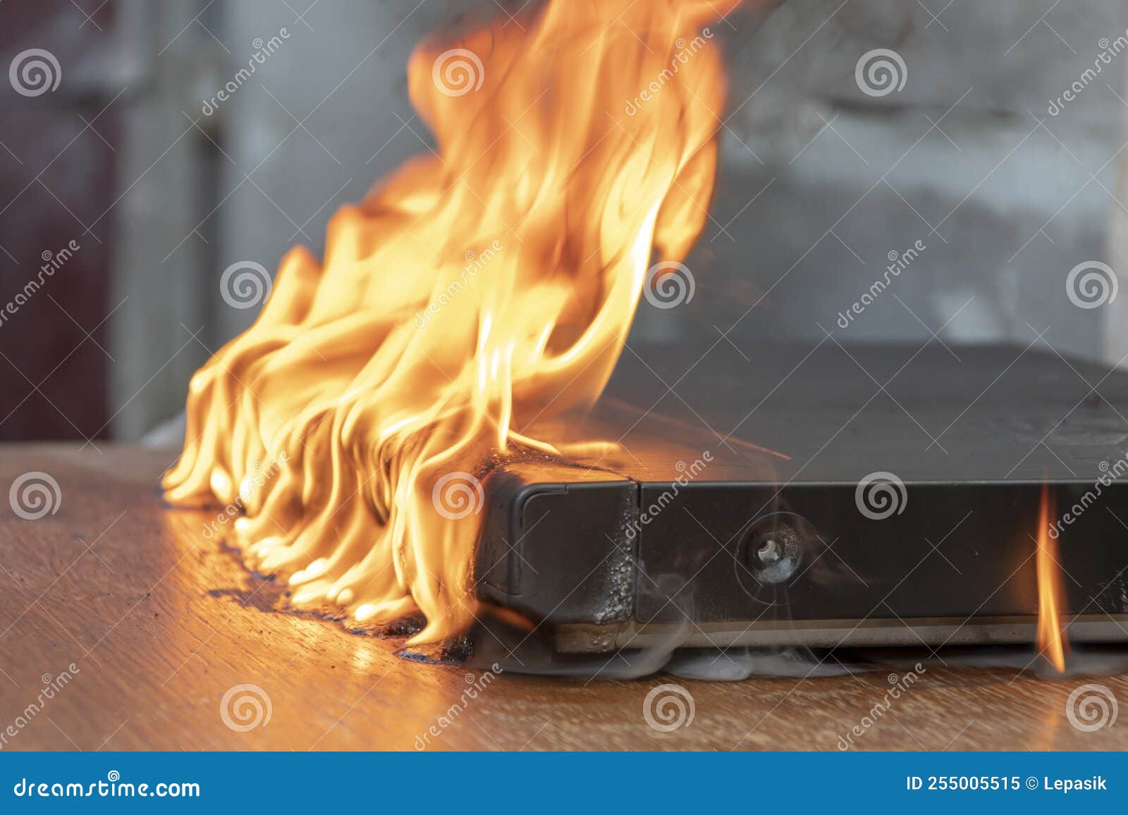 A DVD Player on the Table Burst into Flames, a Melted Case, a Fire in ...