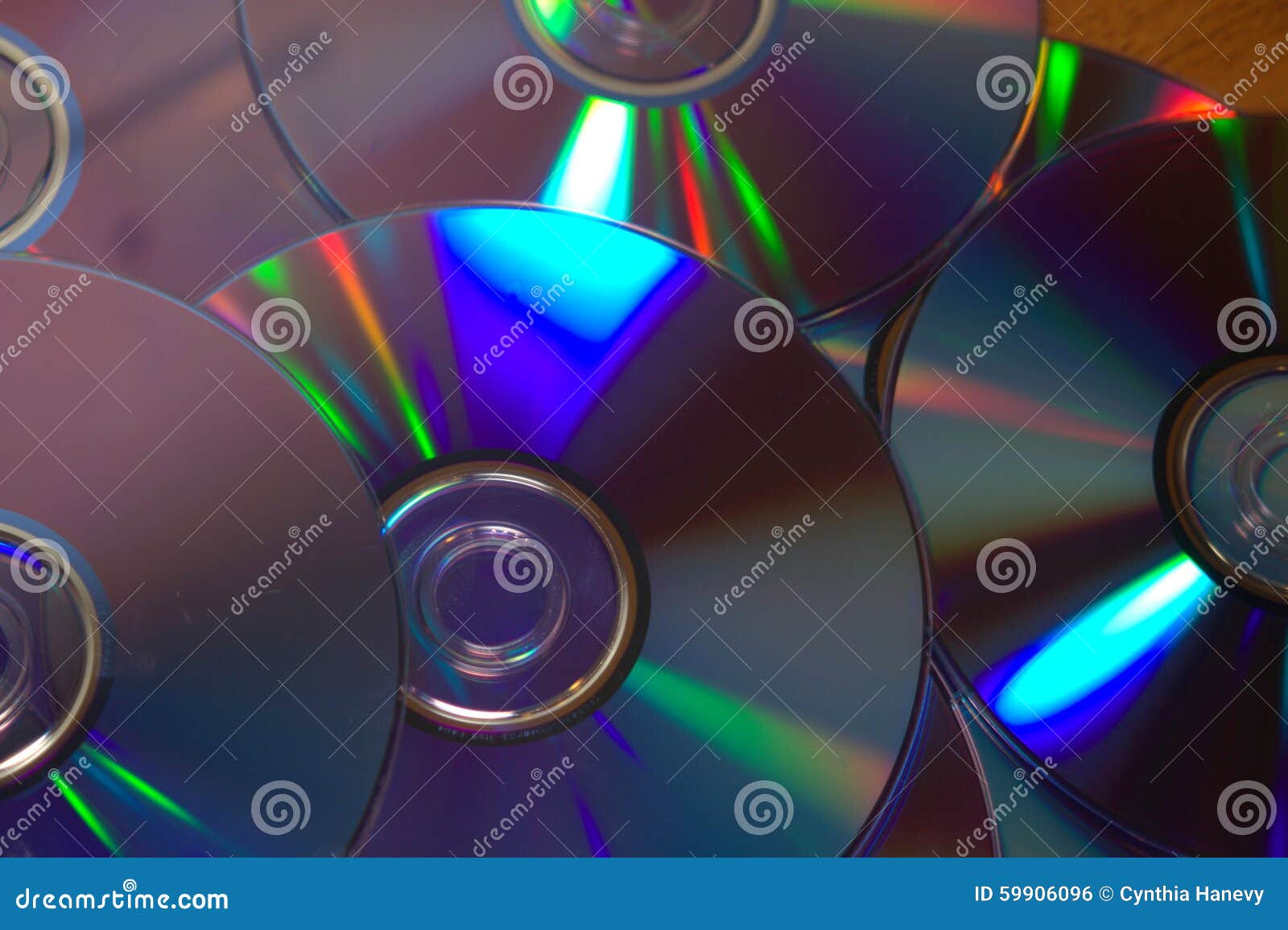 DVDs Reflecting Rainbow Light Stock Photo - Image of reflections ...