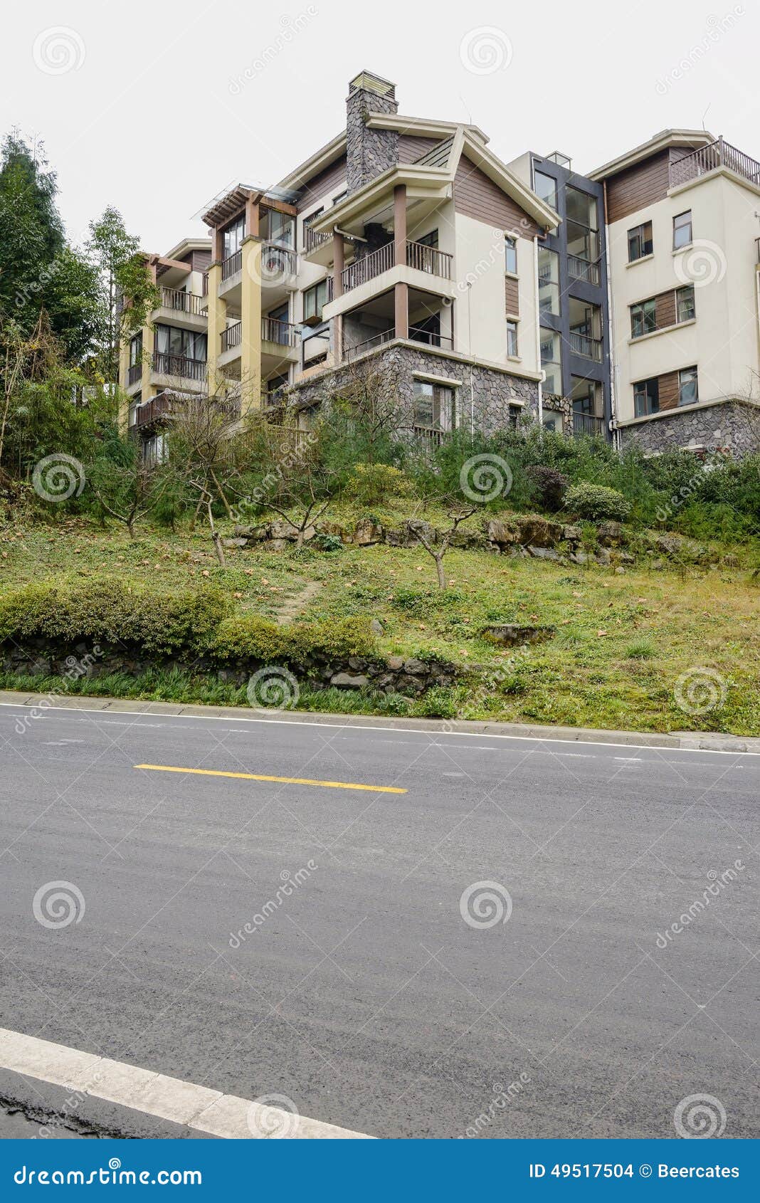 Dwelling Buildings on Hilltop by Asphalt Road Stock Photo - Image of ...
