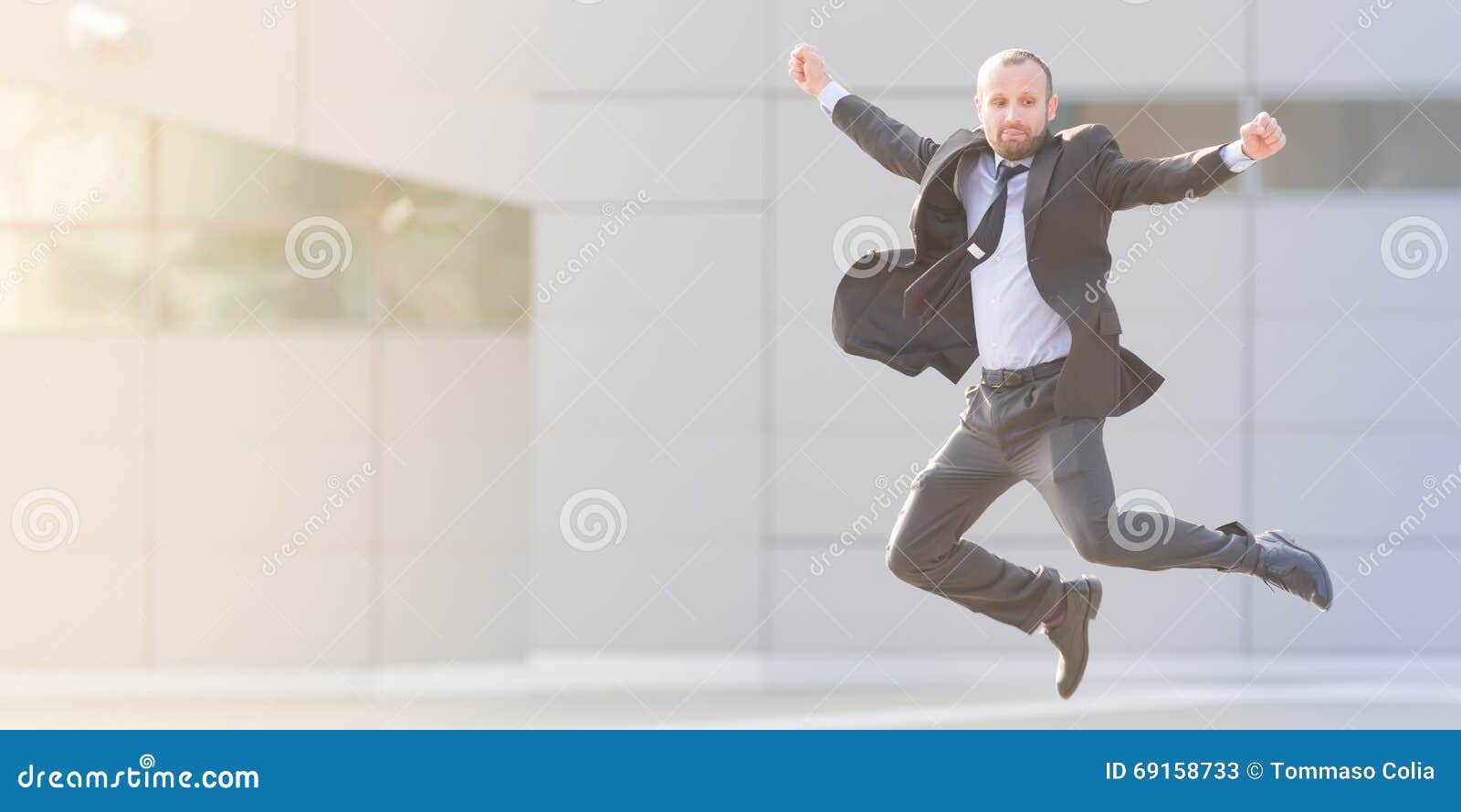 Dynamic Businessman Jumping Outdoor Stock Image - Image of victory ...