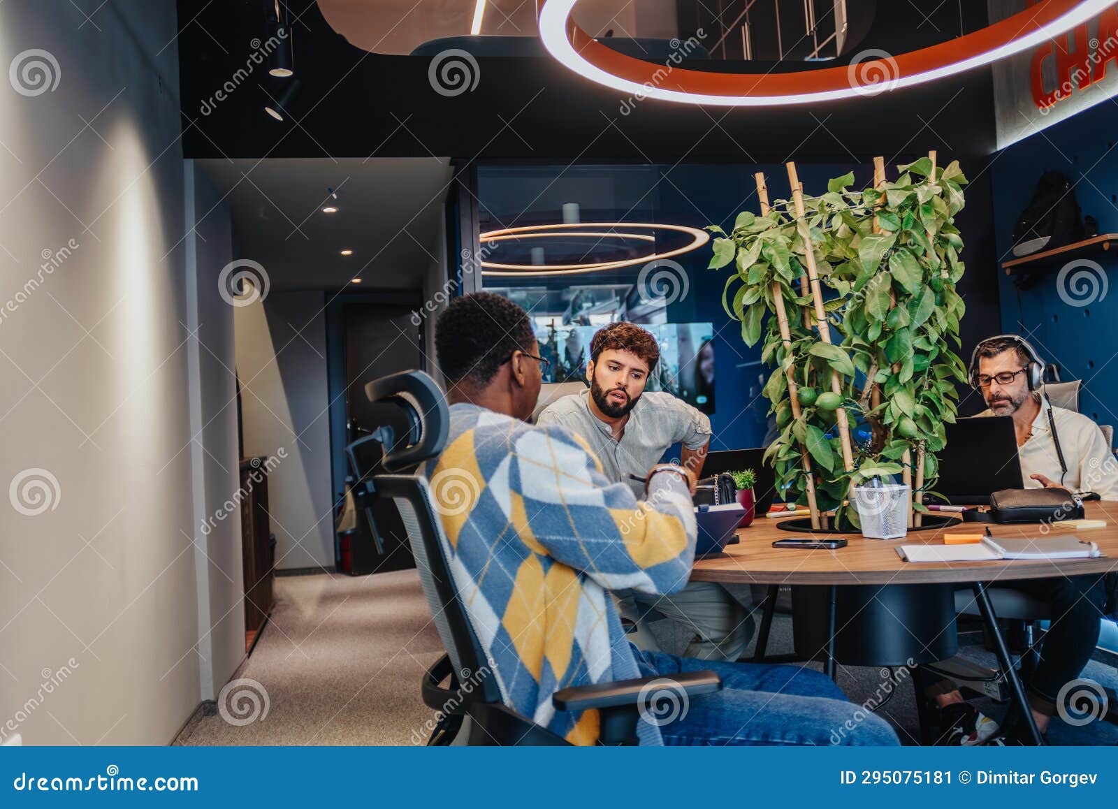 Dynamic Collaboration in a Modern Workspace Stock Image - Image of ...