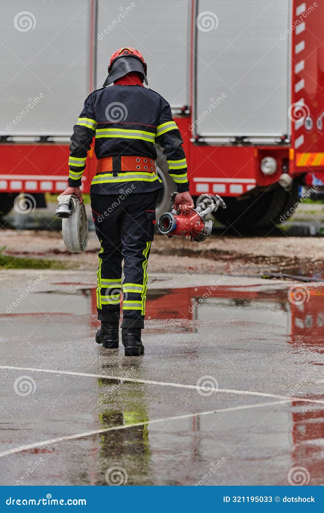 In a Dynamic Display of Synchronized Teamwork, Firefighters Hustle To ...