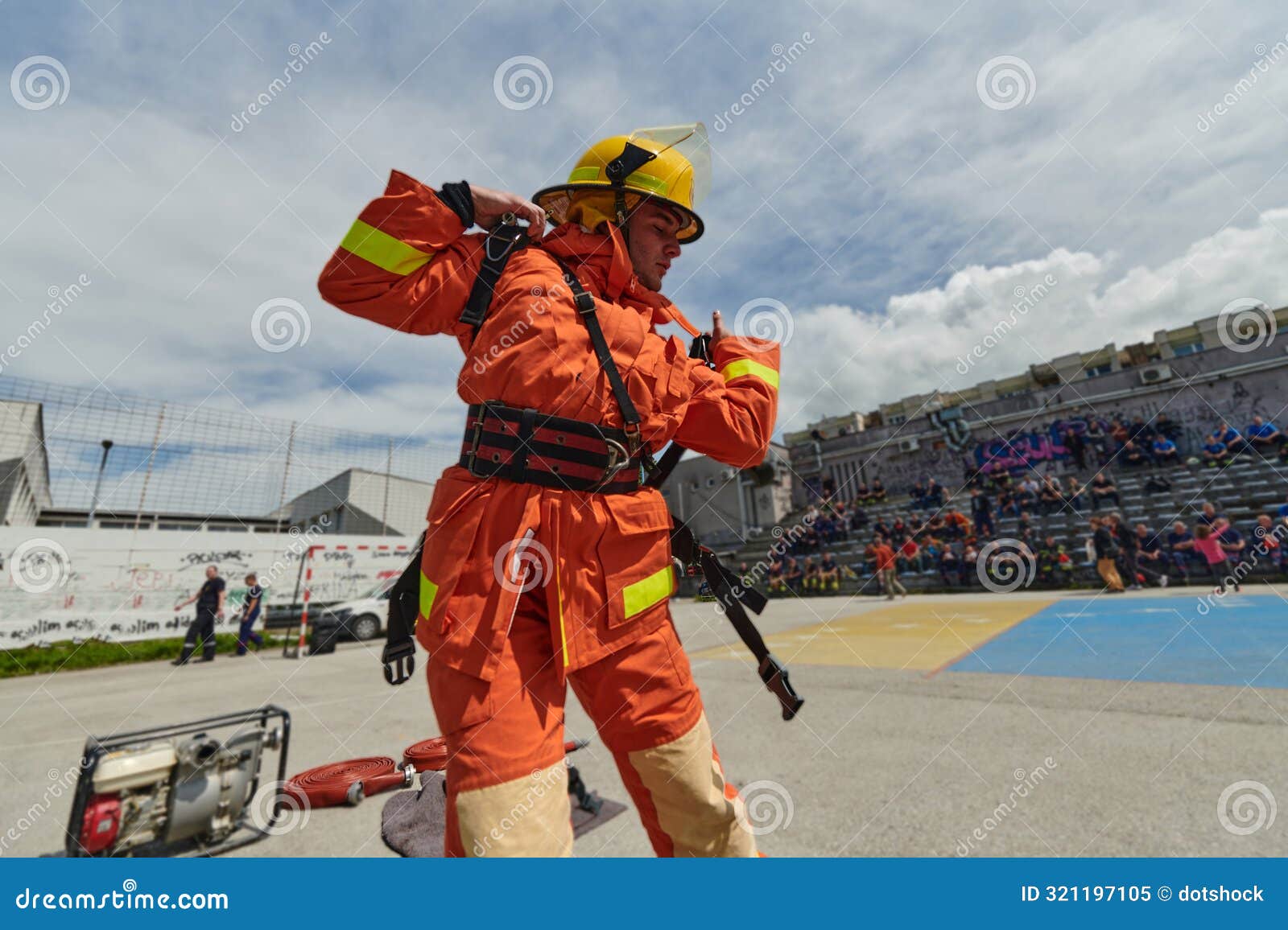 In a Dynamic Display of Synchronized Teamwork, Firefighters Hustle To ...