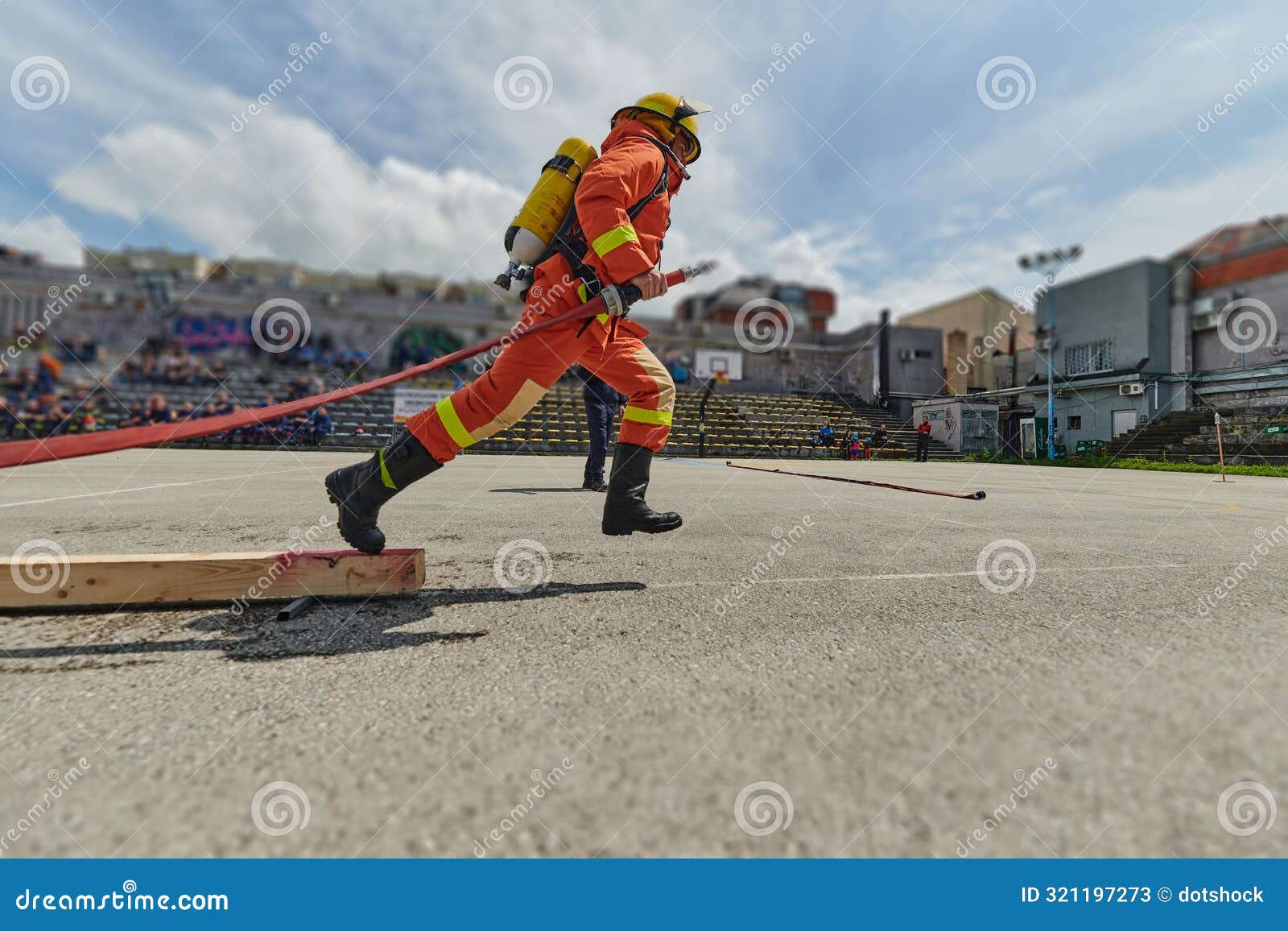 In A Dynamic Display Of Synchronized Teamwork, Firefighters Hustle To ... In A Dynamic Display Of Synchronized Teamwork, Firefighters Hustle To ...