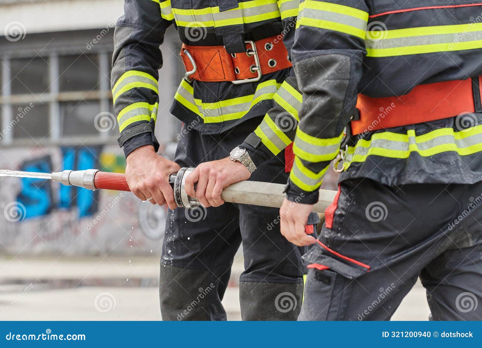 In a Dynamic Display of Synchronized Teamwork, Firefighters Hustle To ...