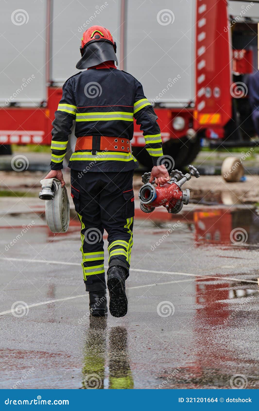 In a Dynamic Display of Synchronized Teamwork, Firefighters Hustle To ...