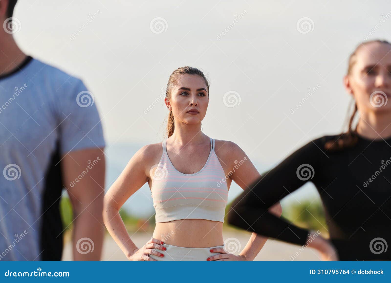 Diverse Athletic Warm-Up: Group Prepares for Intense Running Challenge ...