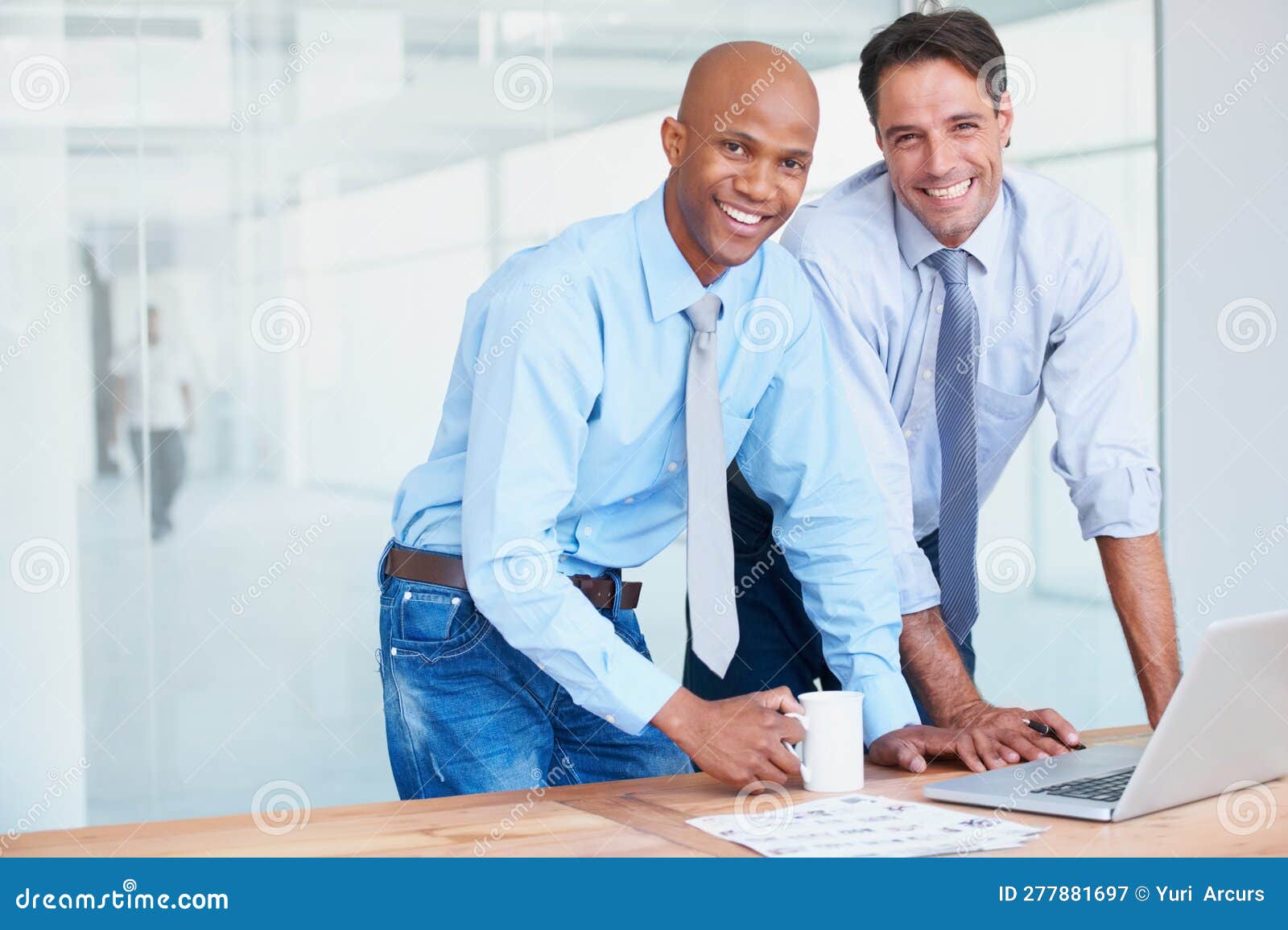 Dynamic Duo. Two Co-workers Smiling while Working in the Boardroom ...