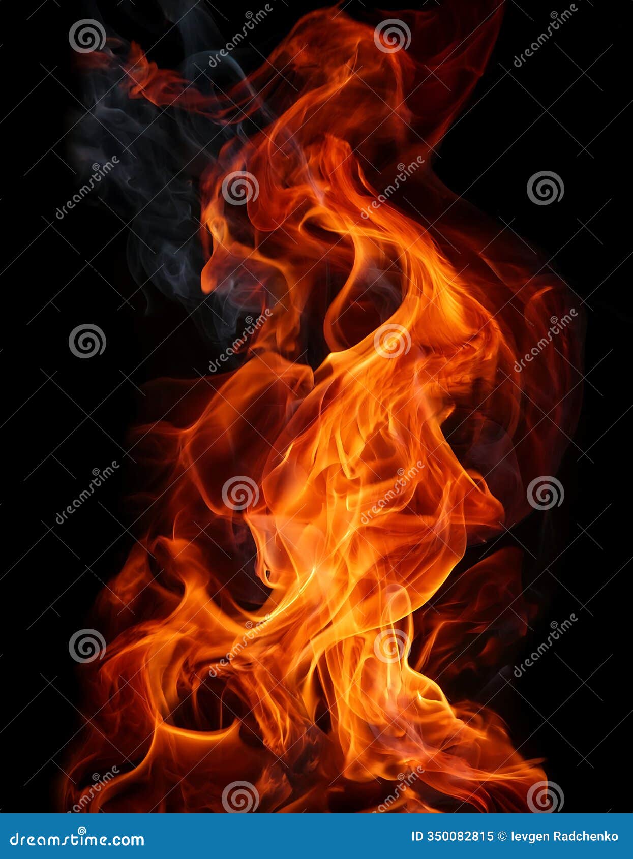Dynamic Flames Twisting and Flowing Against a Black Background Creating ...