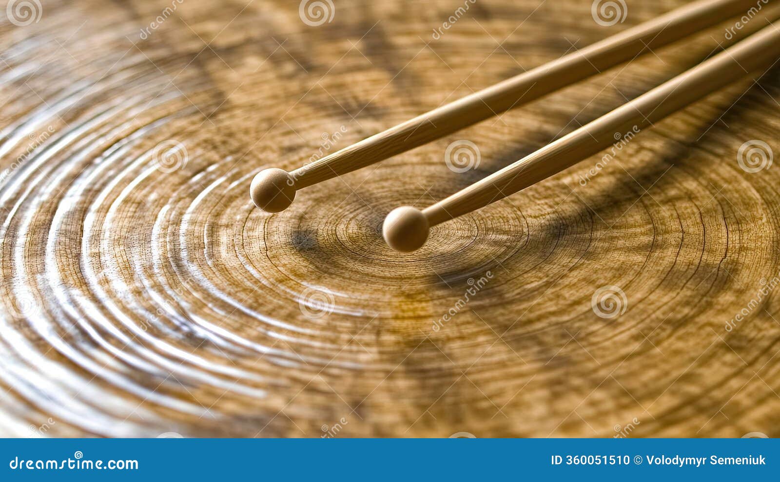 Floating Drumsticks Create Ripples of Rhythm in a Minimalist Artistic ...