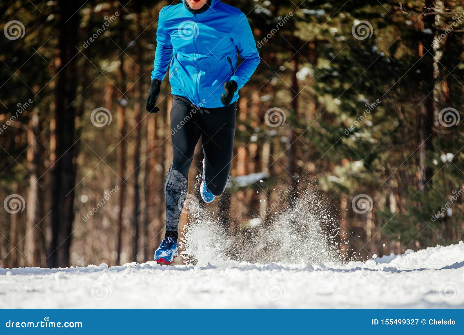 Dynamic Running on Winter Trail Stock Image - Image of blue, runner ...