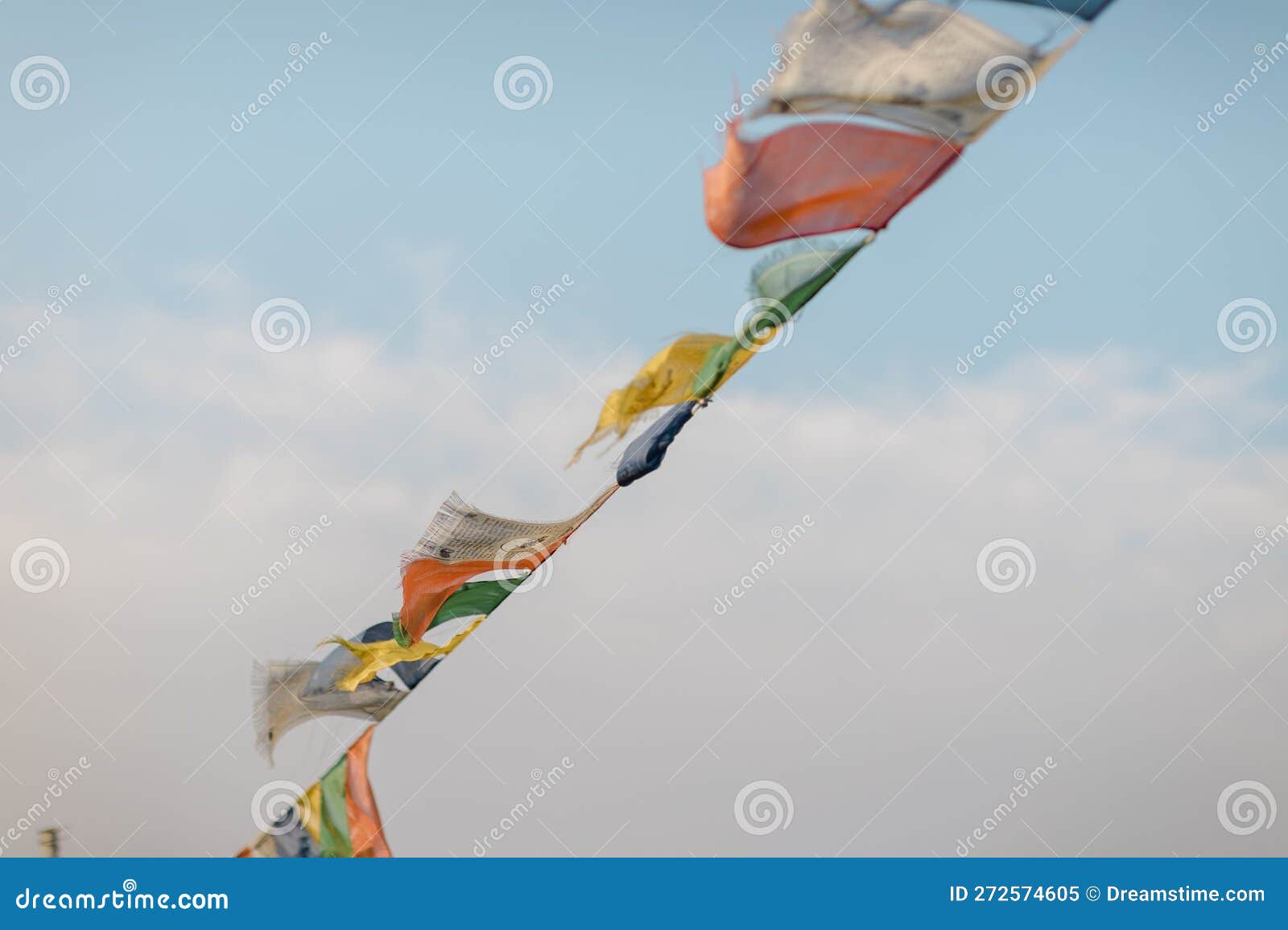 Dynamic Scene Featuring a Colorful Array of Flags Fluttering in the ...