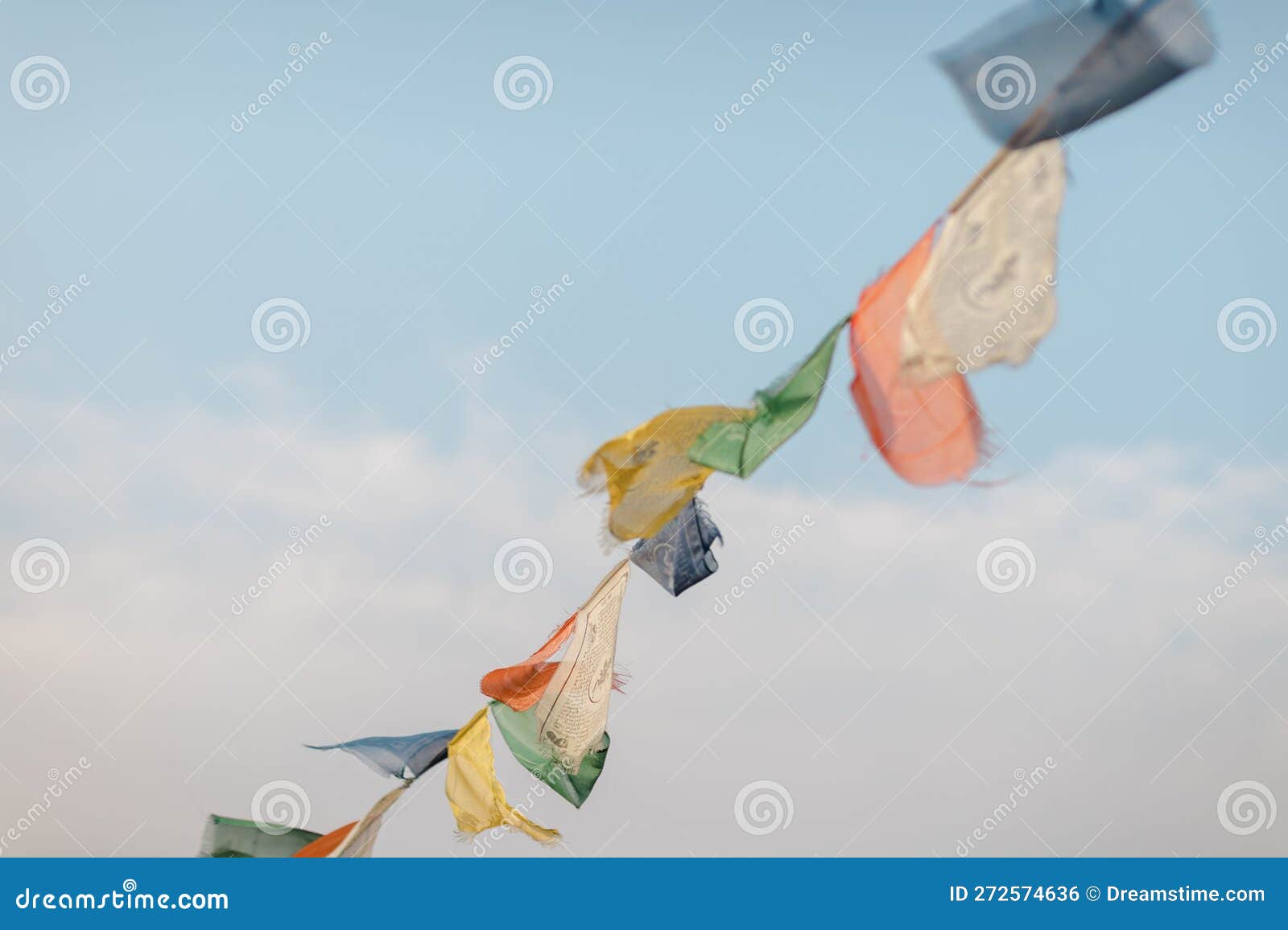 Dynamic Scene Featuring a Colorful Array of Flags Fluttering in the ...