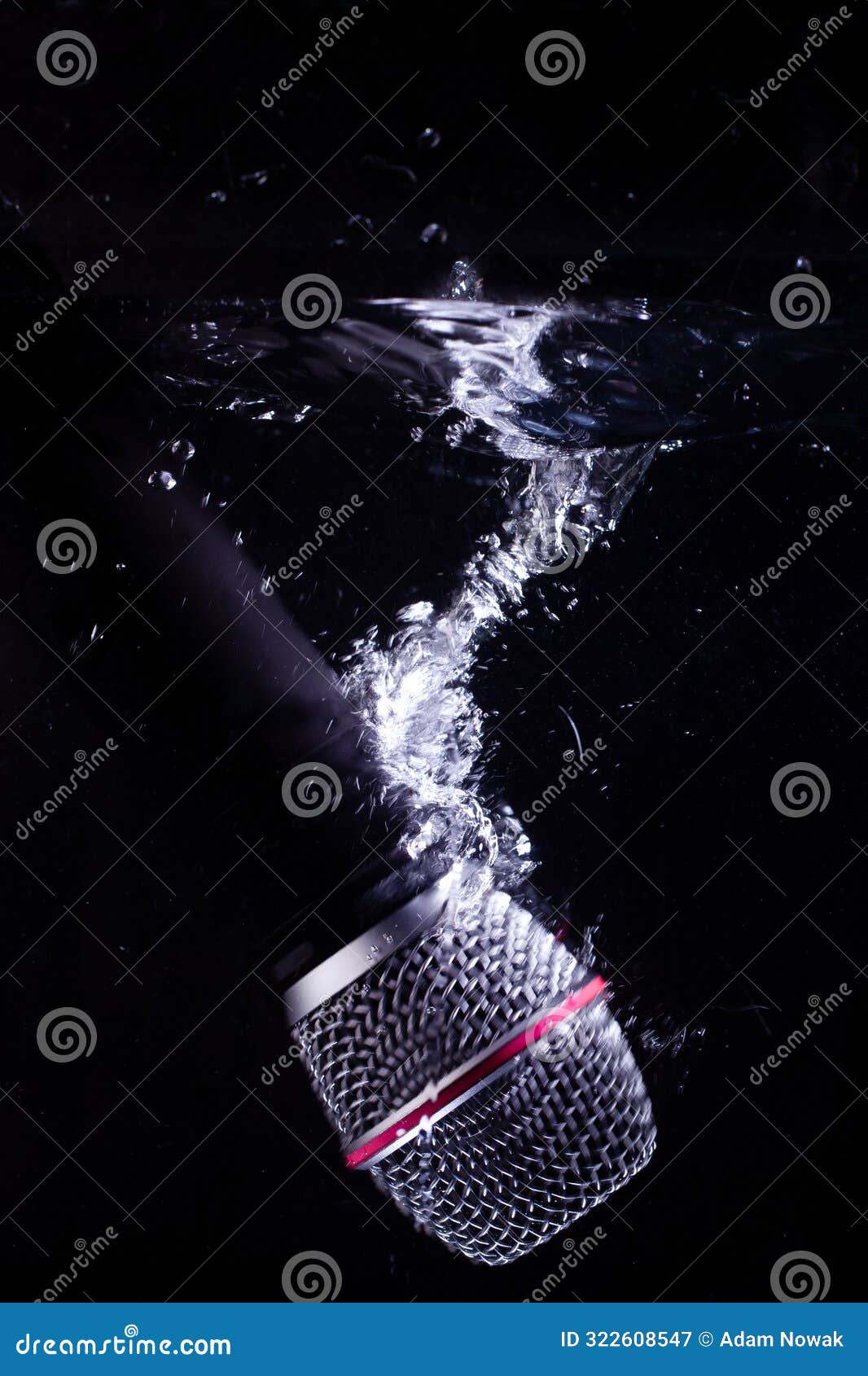 A Microphone Splashing into the Water. Microphone Stock Image - Image ...