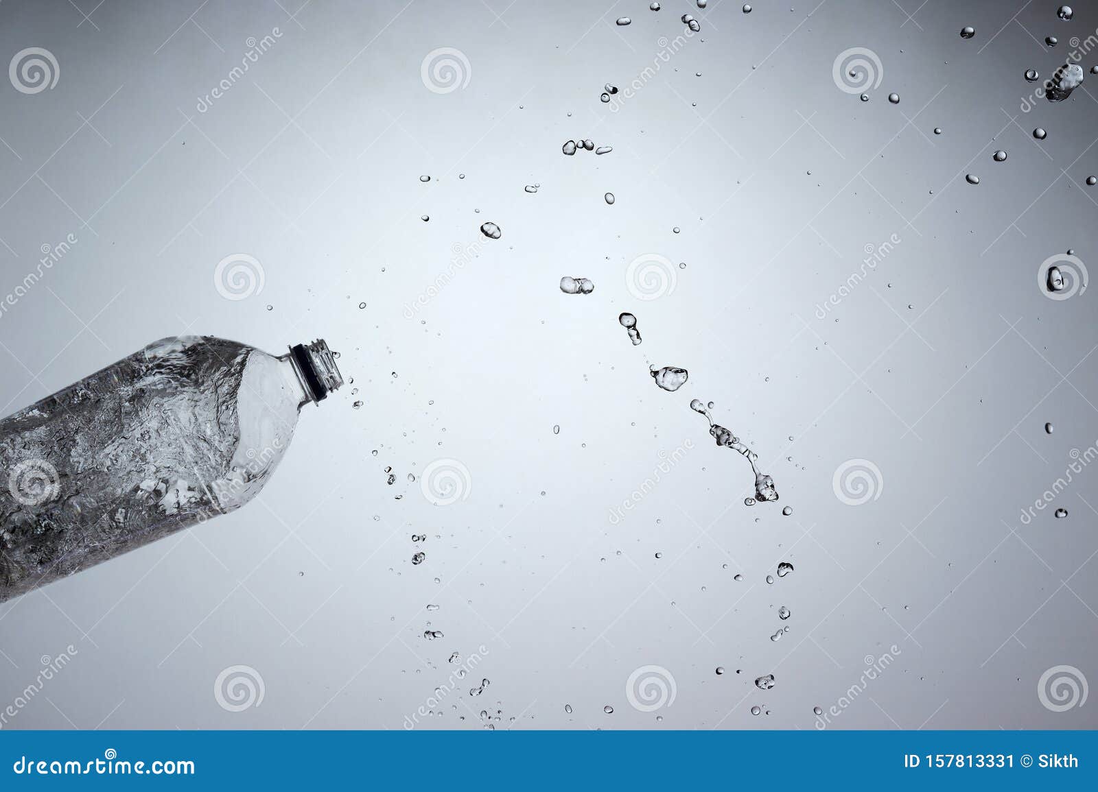 Dynamic Shot of Water Spilling Out of Bottle Stock Image - Image of ...