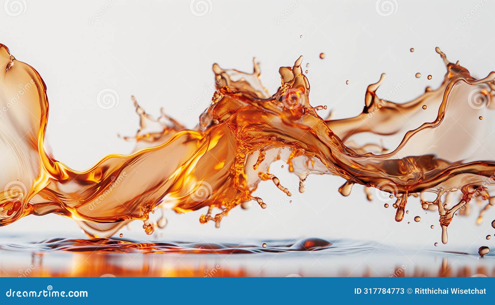 Dynamic Splash of Amber Liquid Captured in Mid-air Against a White ...