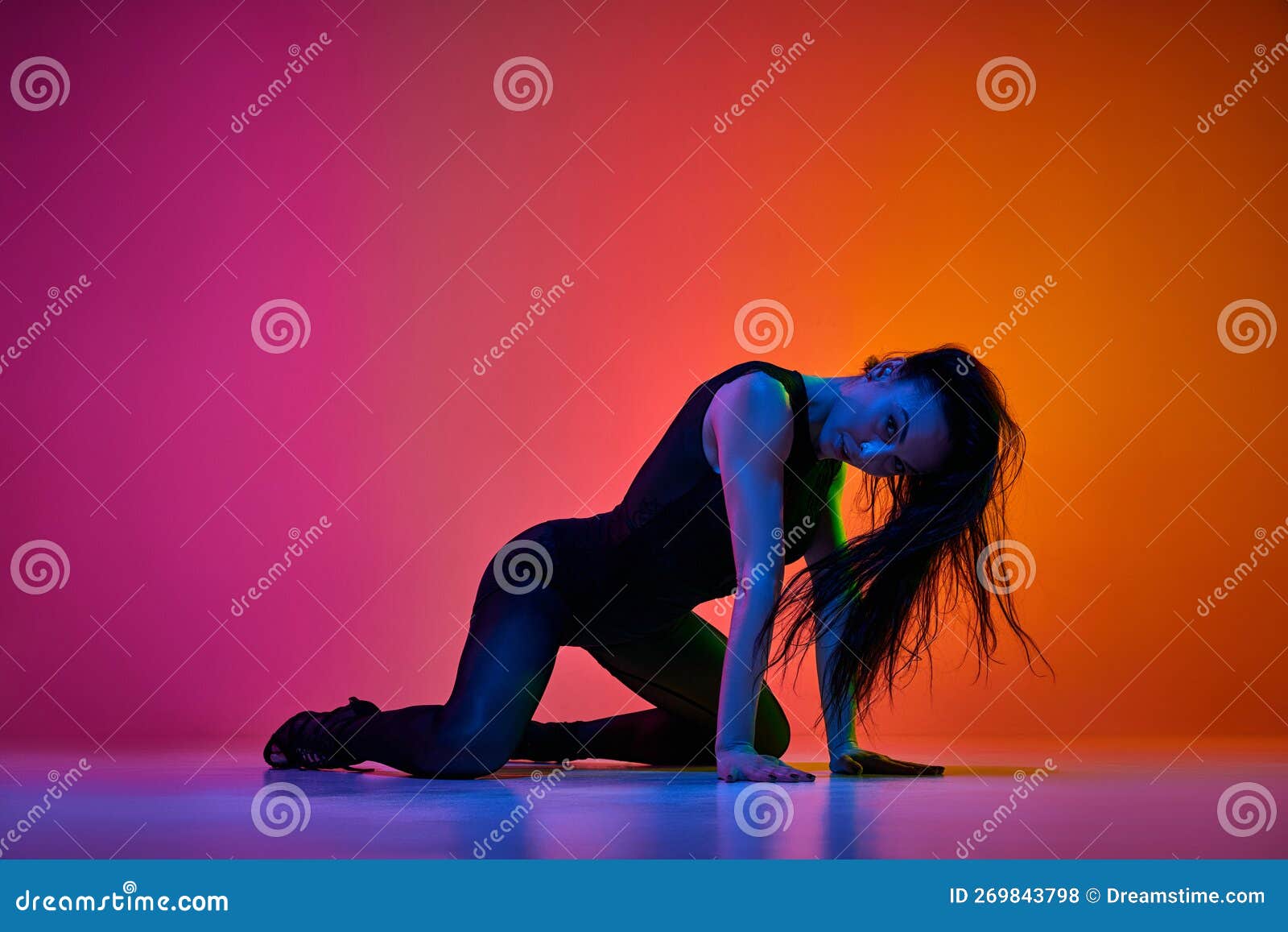 Dynamic Studio Shot of Talented Female Dancer Performing on Stage Over ...