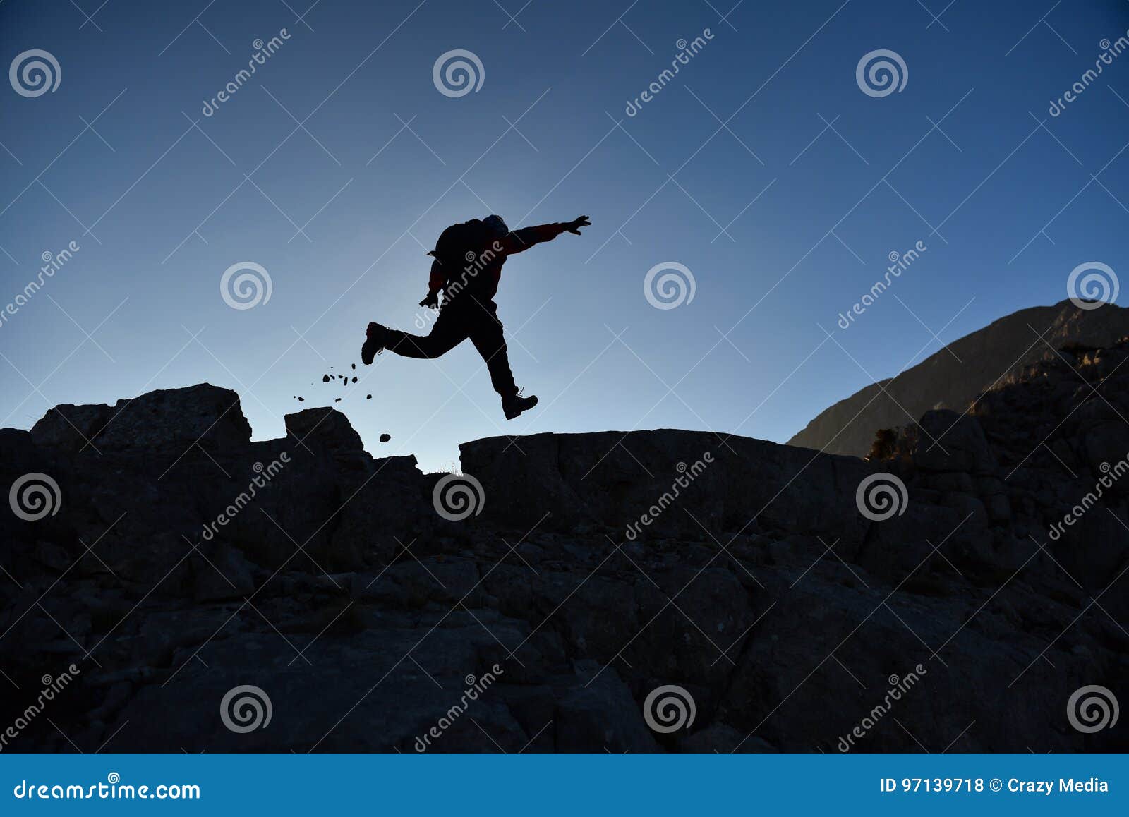Dynamic Summit Climber in the Rocks Stock Photo - Image of power ...