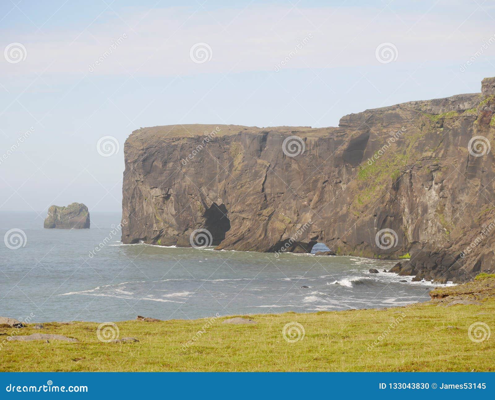 Dyrholaey Peninsula with Sea Arches from Cliff Top Stock Photo - Image ...