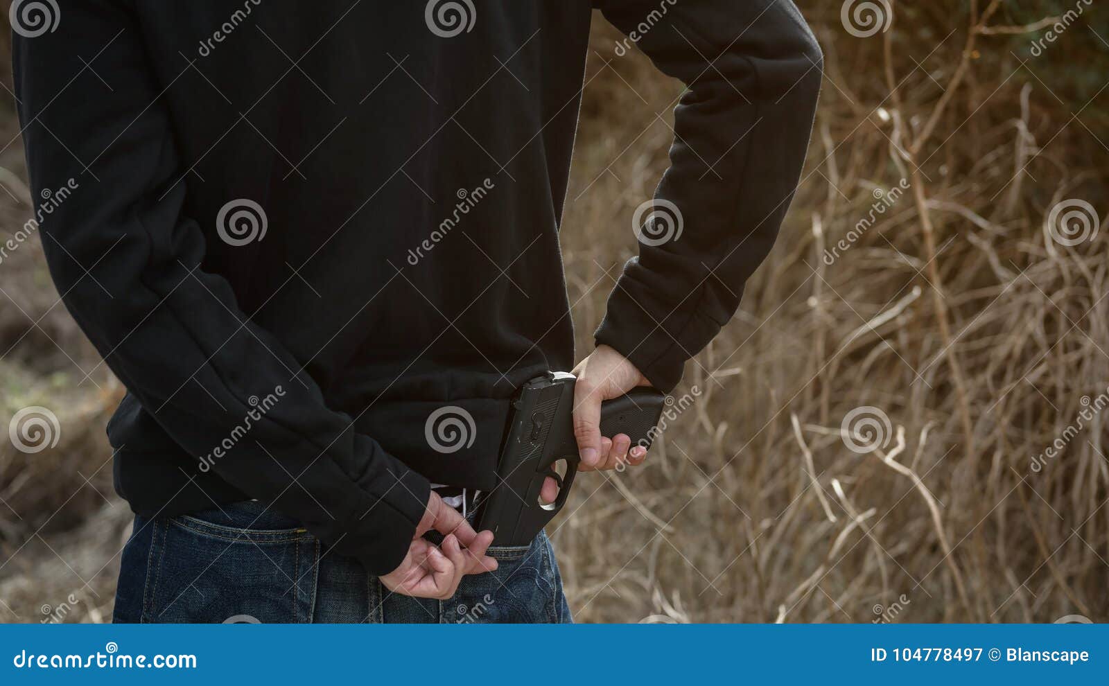 Robber Hide Gun in Back Pocket Immagine Stock - Immagine di espressione ...