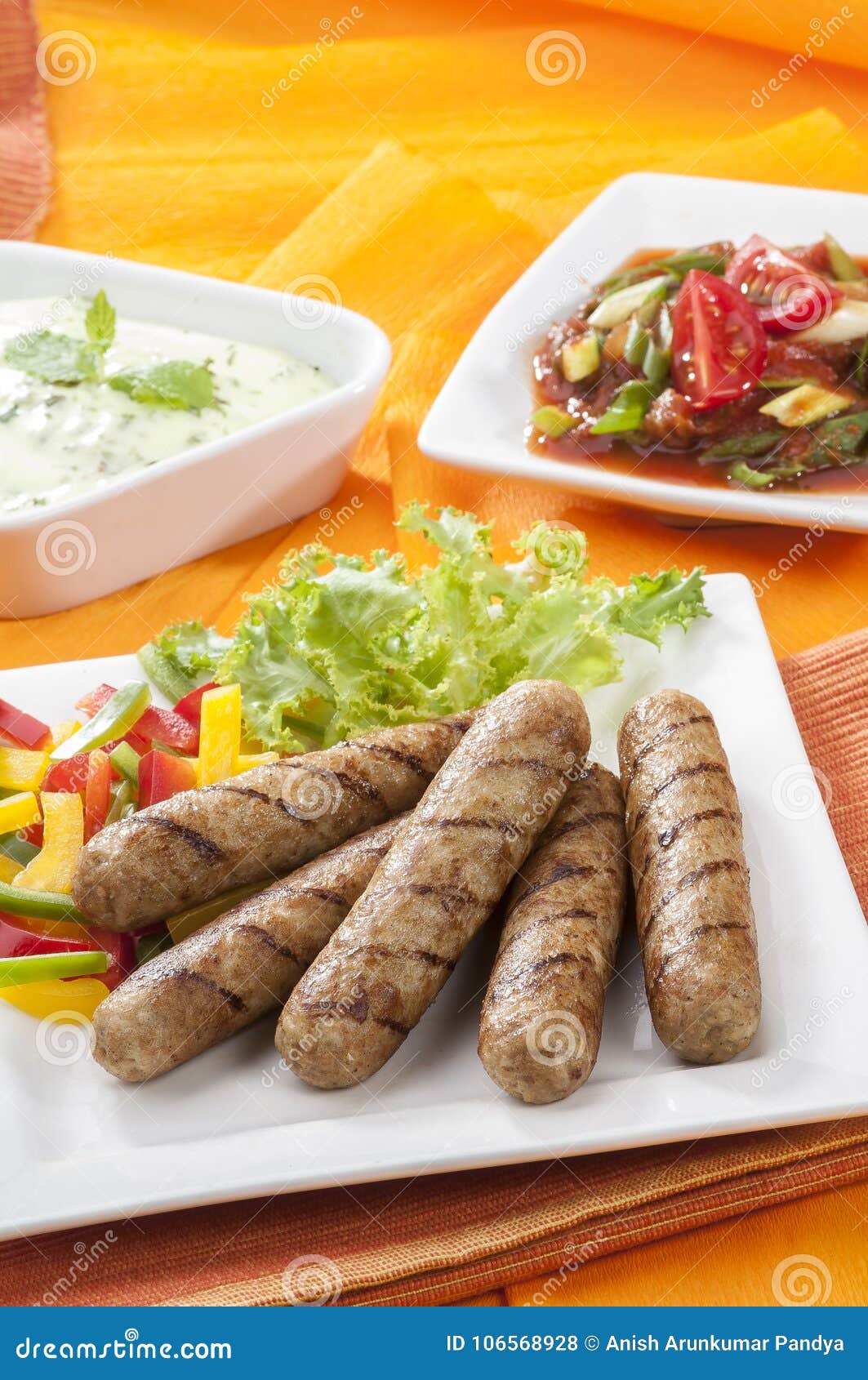 Chicken Seekh Kebabs with Letus Coloured Bell Pepper with Tomato Onion ...