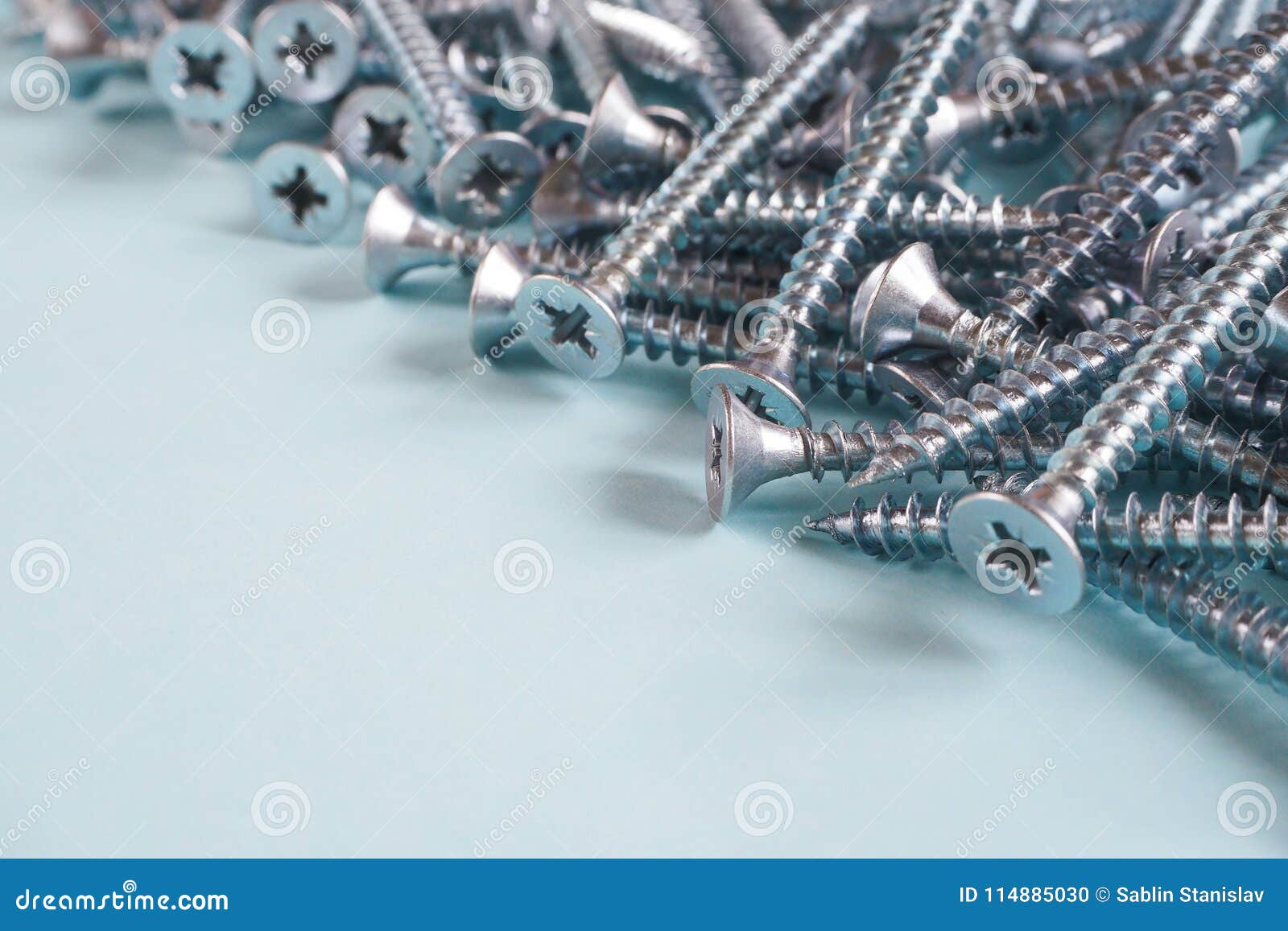 White Construction Screws on Blue Background. Foto de Stock - Imagem de ...