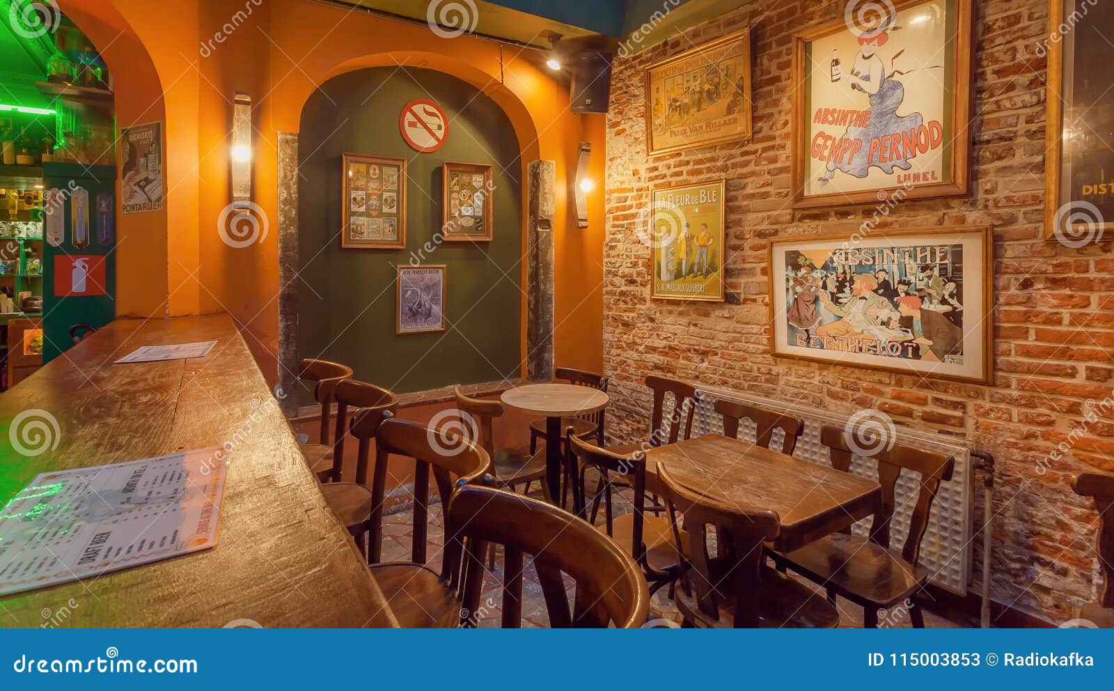 Interior of Brick Walls Bar with Old Posters, Retro Furniture, Pub ...