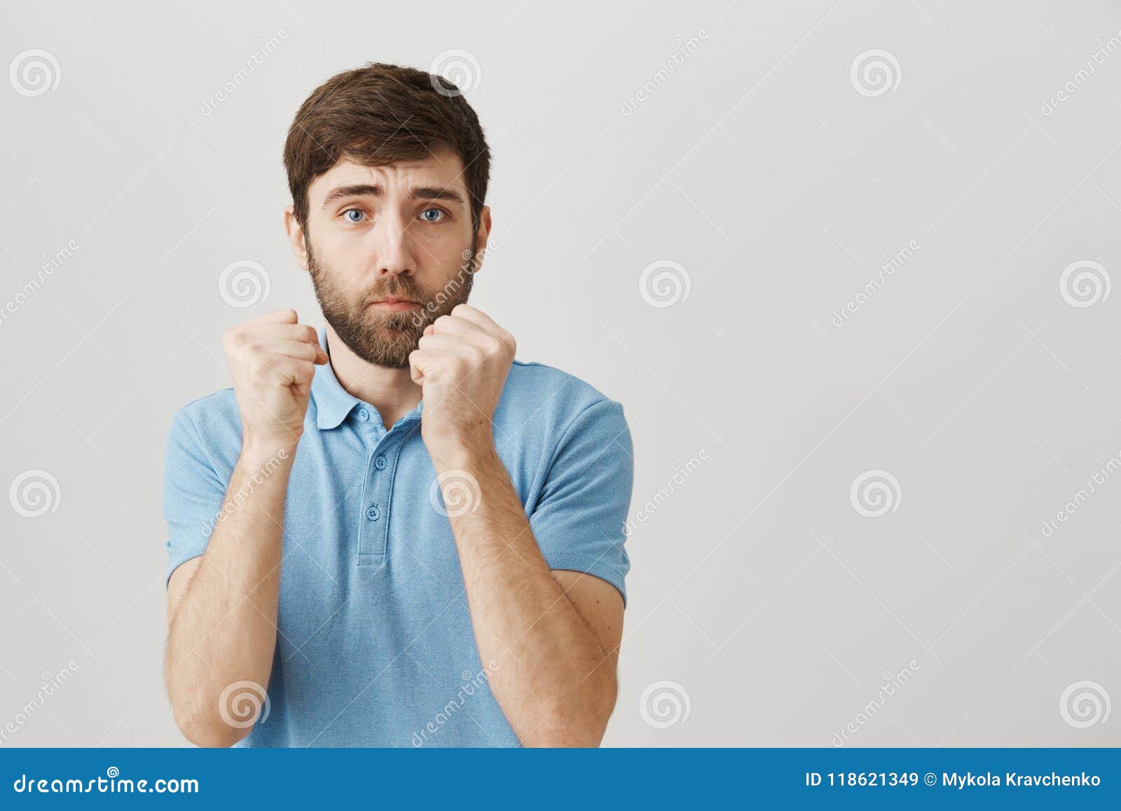 Upset and Scared Slim European Male with Beard, Looking Weak and ...