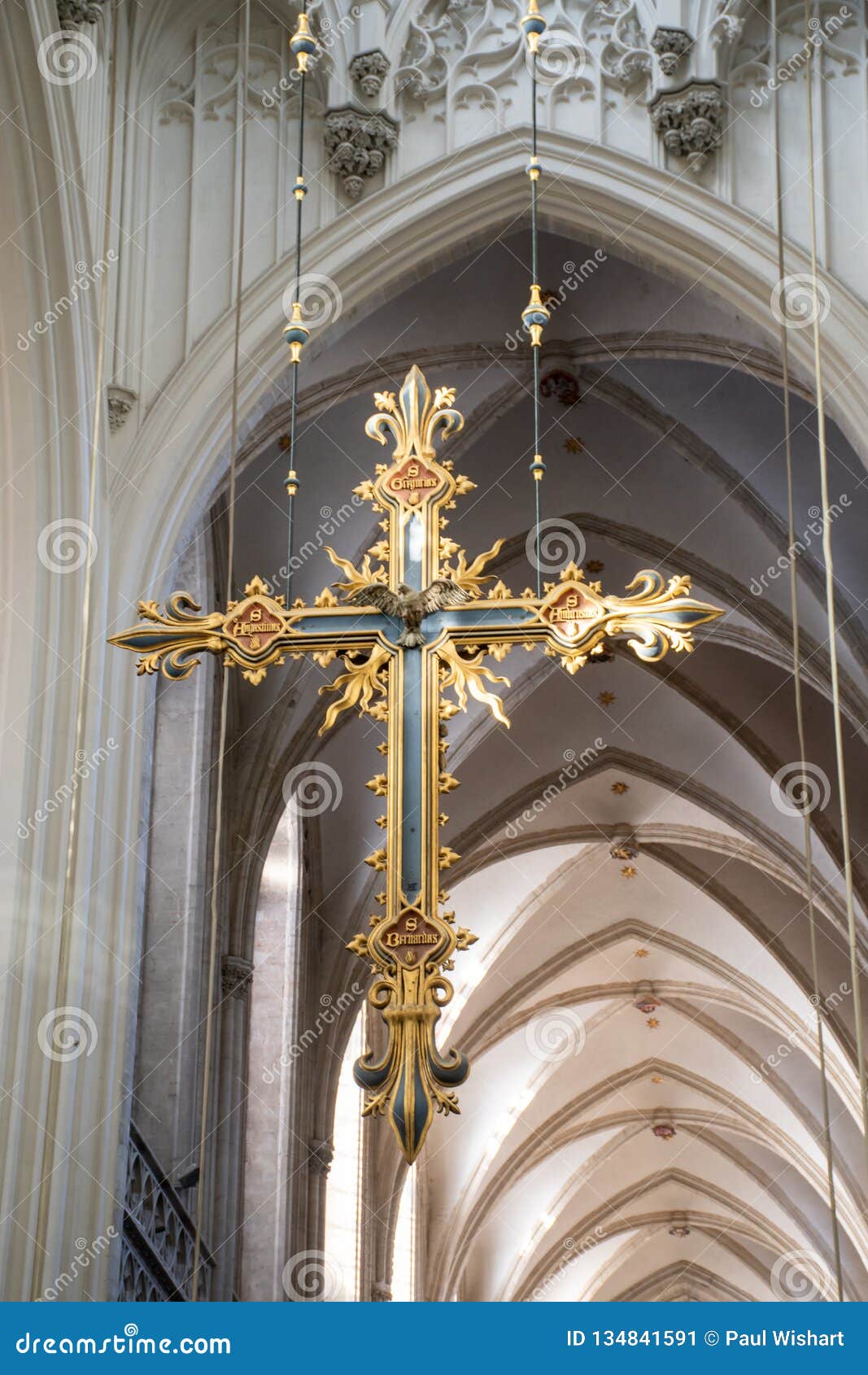 Huge Cross Hanging Down in Cathedral with Arches Imagen de archivo ...