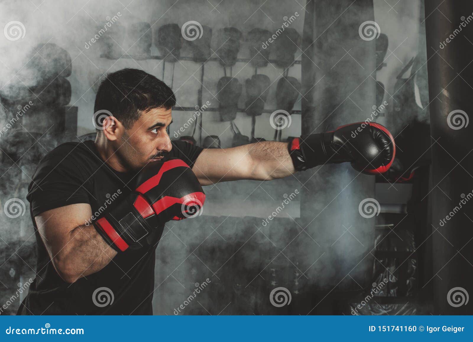 Eastern Arab Boxer Looks at the Box with a Punching Bag Stock Foto ...