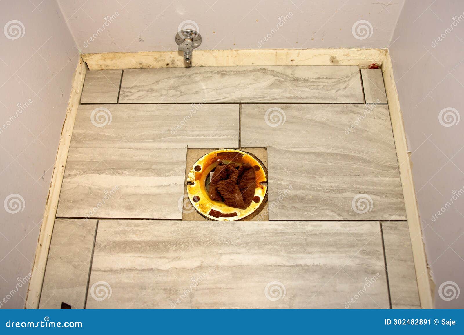 E Bathroom Tiling Around Toilet Drain Stock Image - Image of unfinished ...