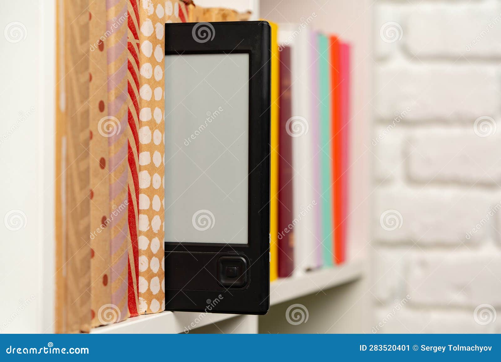 E-book Reader Device on Background of Paper Books Copy Space Stock ...