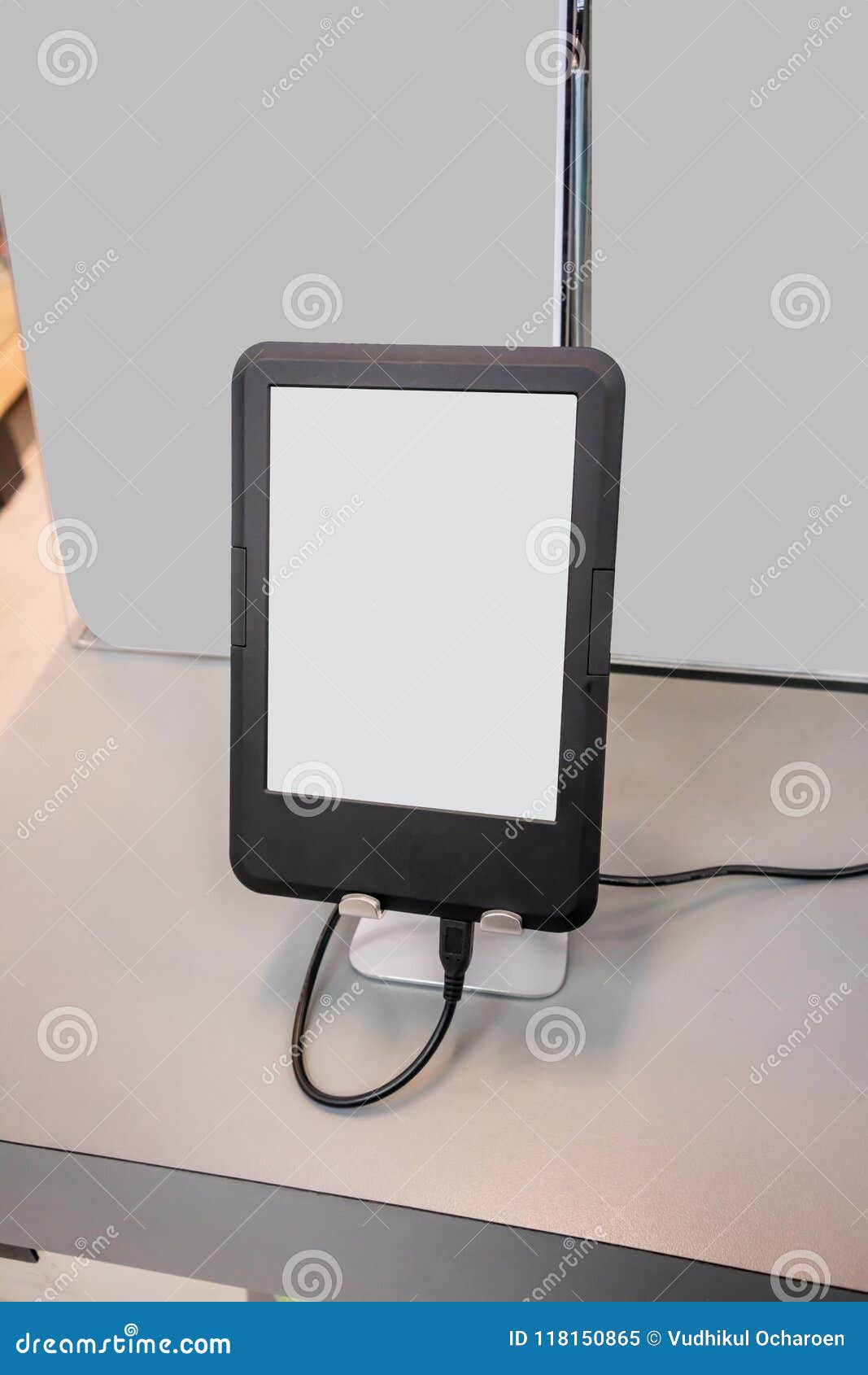 An E-book Reader Device in Black Matte on Metal Stand Stock Image ...