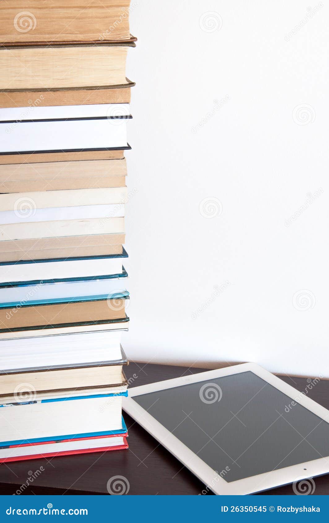 E-book Reader and Stack of Books Stock Image - Image of hightech ...