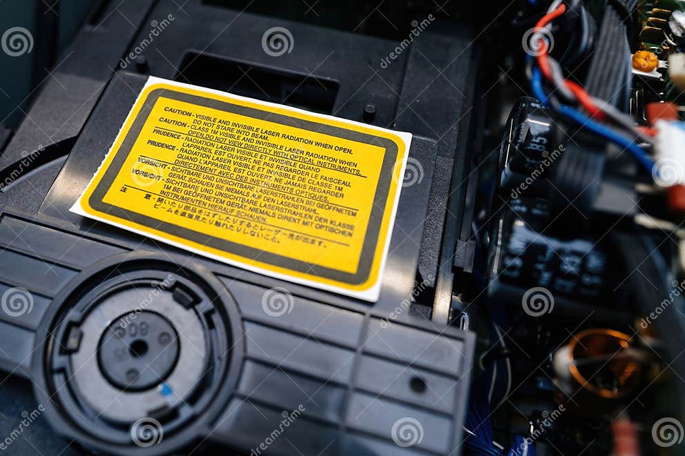 E: CD Player Internal Component with Caution Label Editorial Stock ...