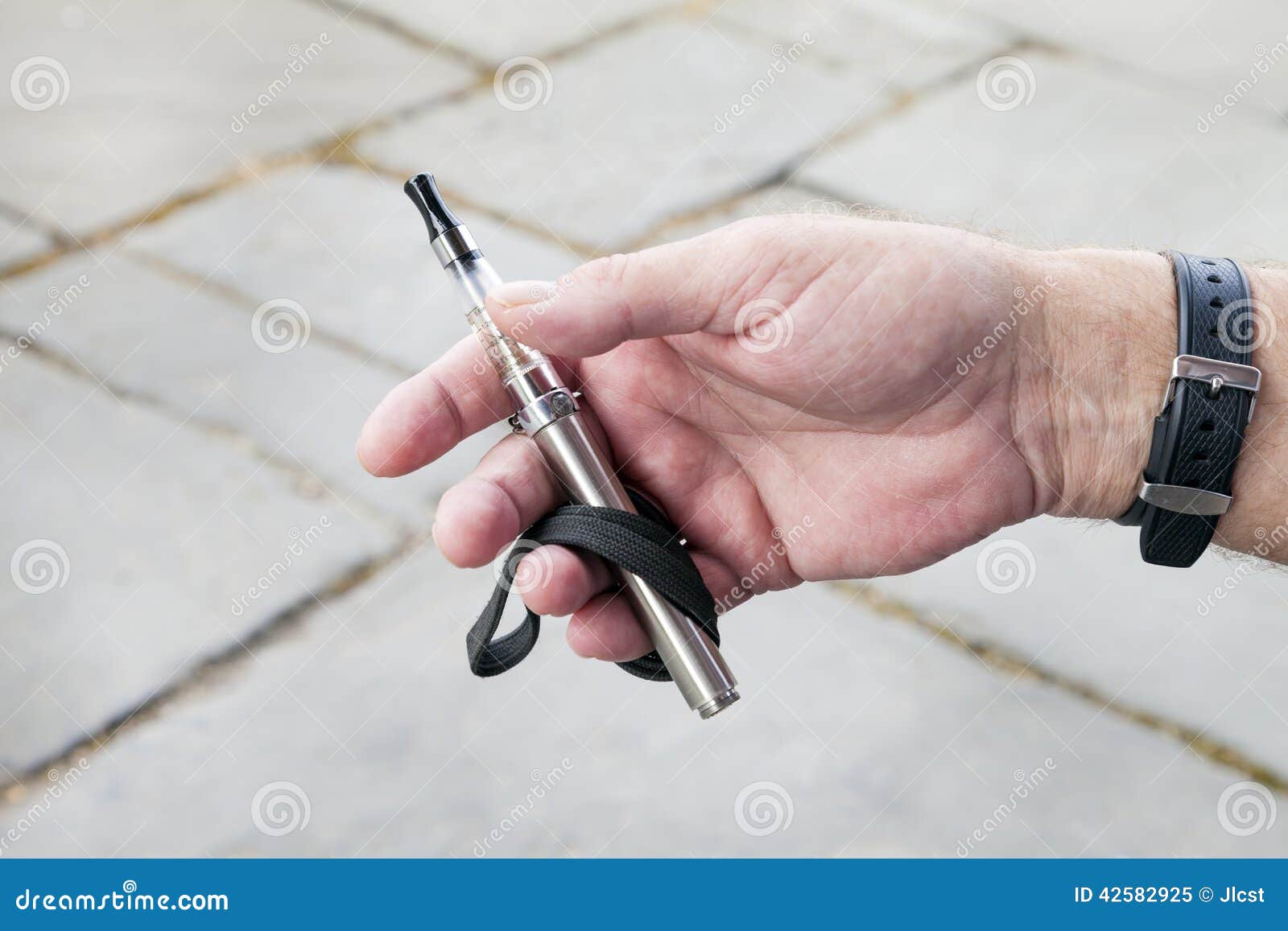 Cigarette In A Hand With Handcuffs Royalty-Free Stock Photo ...