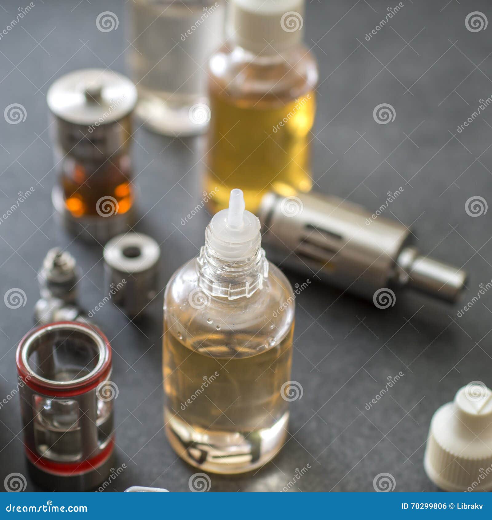 E Cigarettes Liquid Bottle on Table Stock Photo - Image of flavor ...