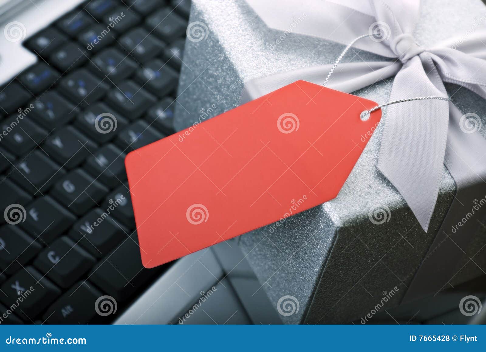 E Commerce Gift with Blank Tag and Laptop Stock Photo - Image of ...