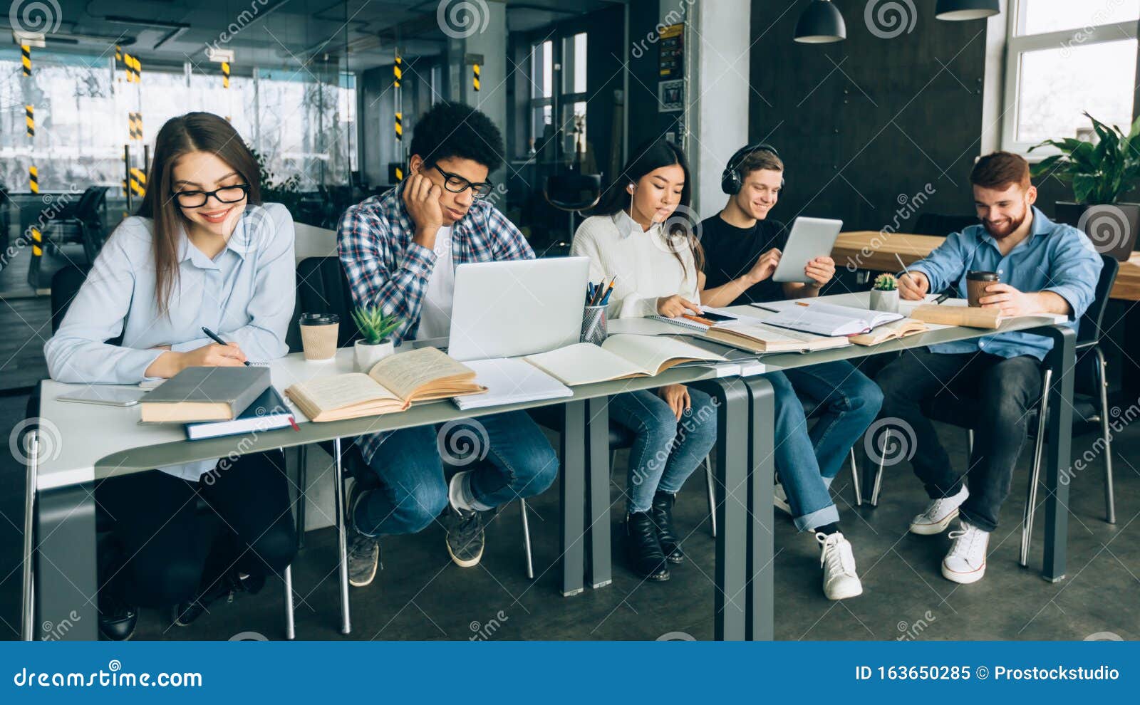 E-learning Concept. Classmates Studying in University Library Stock ...