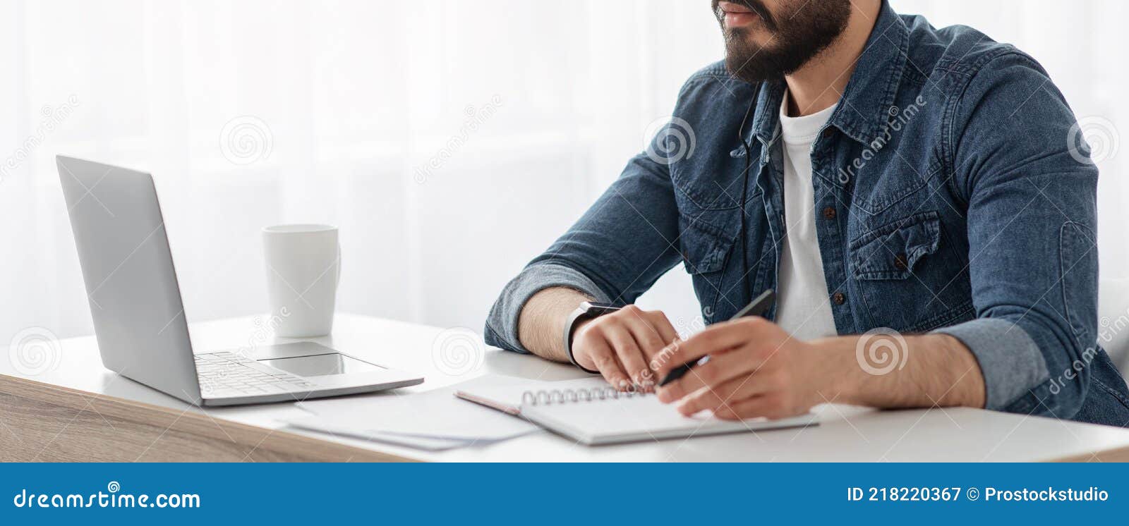 E-learning Concept. Guy Sitting at Desk and Writing in Notebook, Taking ...