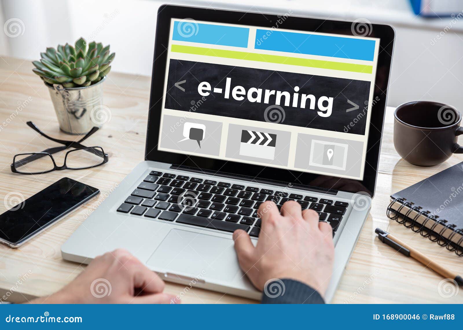Man Working on a Laptop with the Word E-learning on the Computer Screen ...