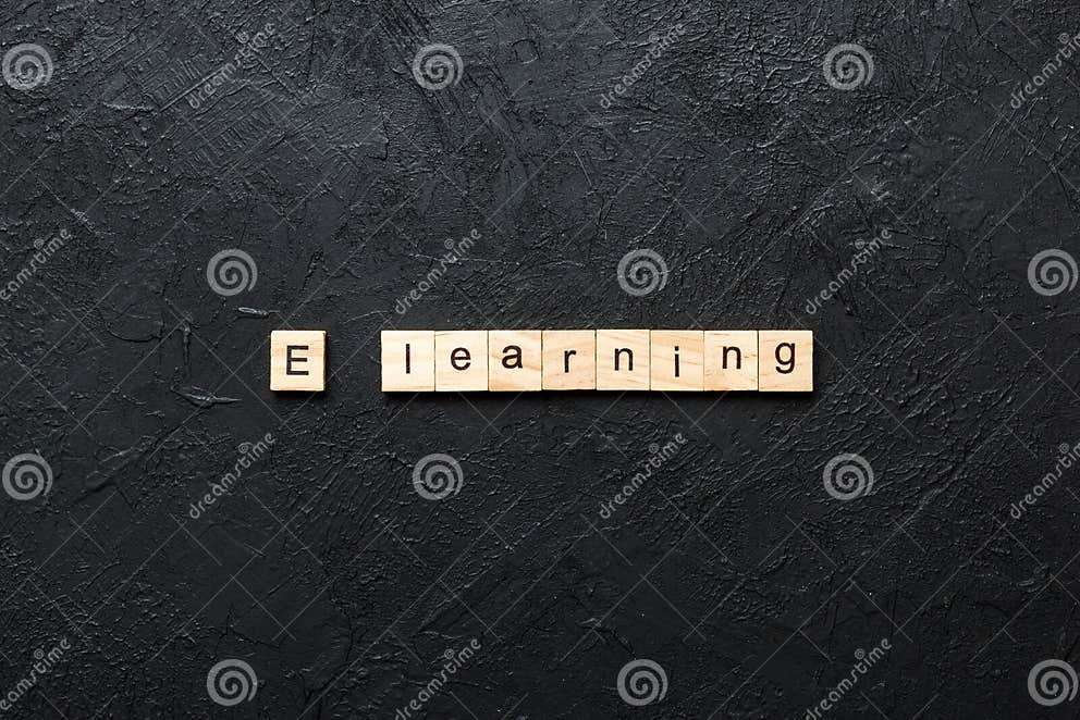 E Learning Word Written on Wood Block. Elearning Text on Cement Table ...