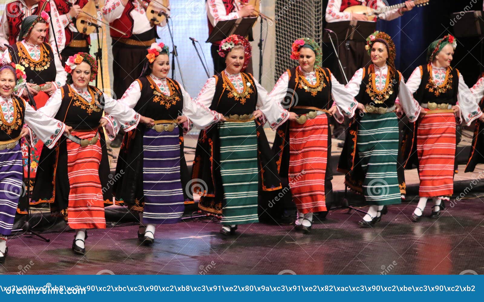 People in Traditional Folklore Costumes Perform Folk Dance Bulgarian ...
