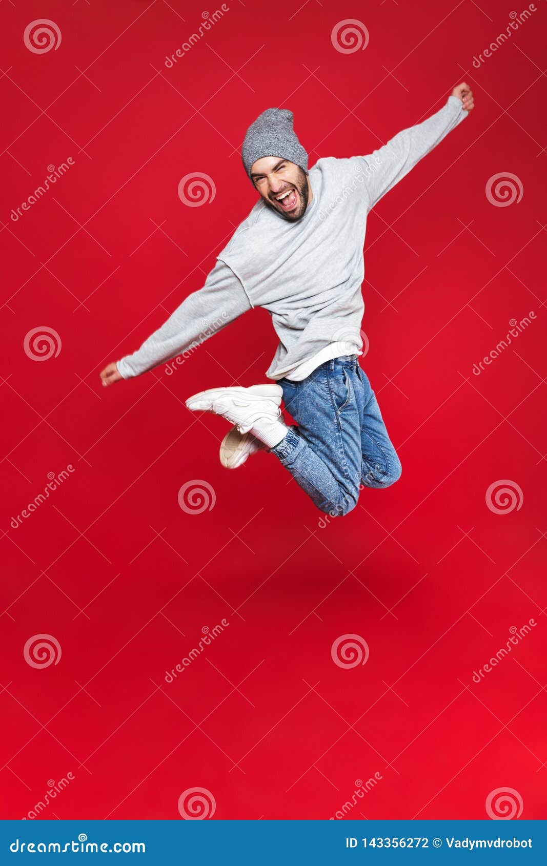 Full Length Photo of Energetic Man Smiling and Jumping Isolated Over ...