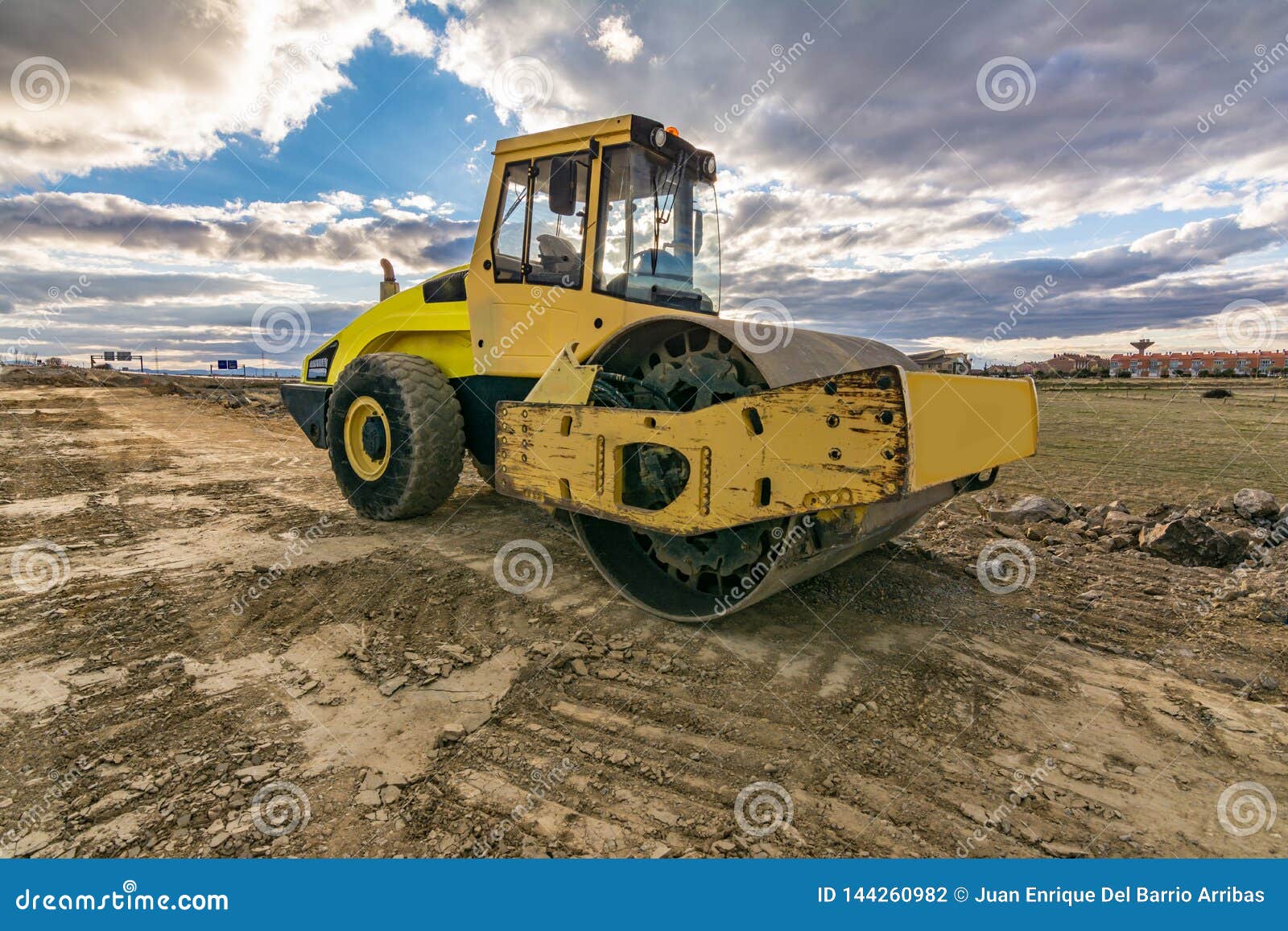 Steamroller Performing Leveling Work on a Road Under Construction ...