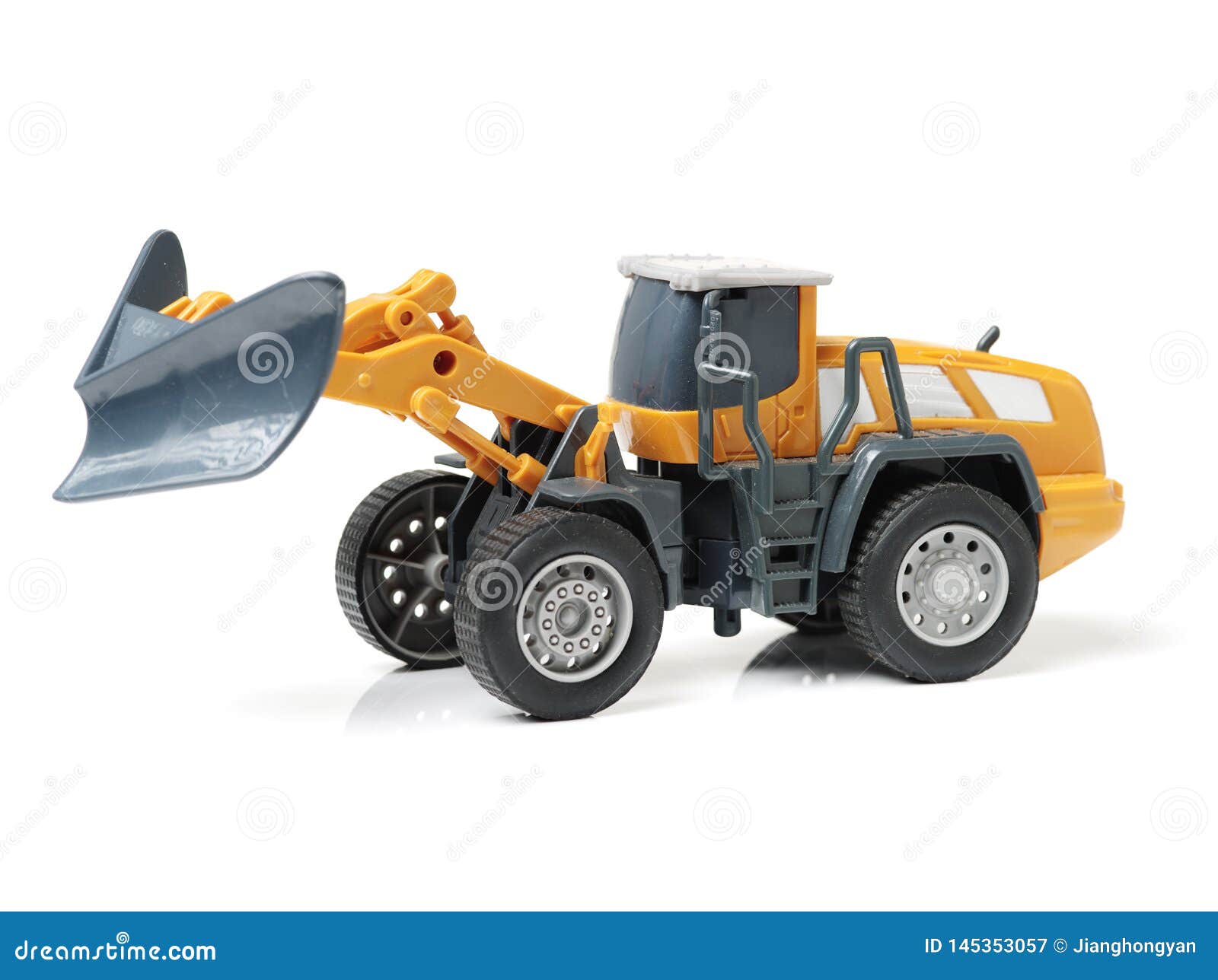 Child`s toy scraper stockbild. Bild von studio, zicklein - 145353057