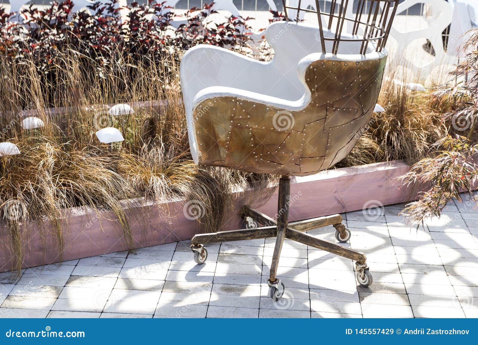 Designer Metal Chair with Rivets and Rust with Wheels Imagem de Stock ...