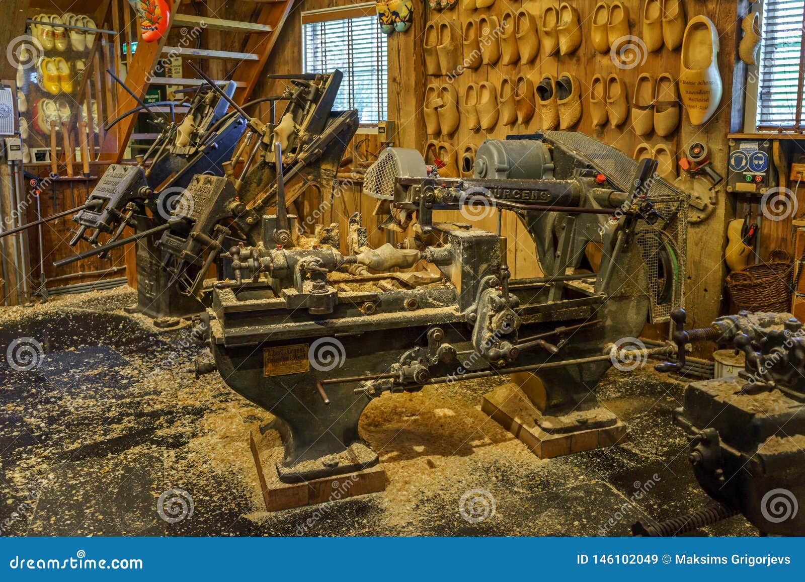 Traditional Old Clog Making Machine in Workshop with Wooden Shoes on ...