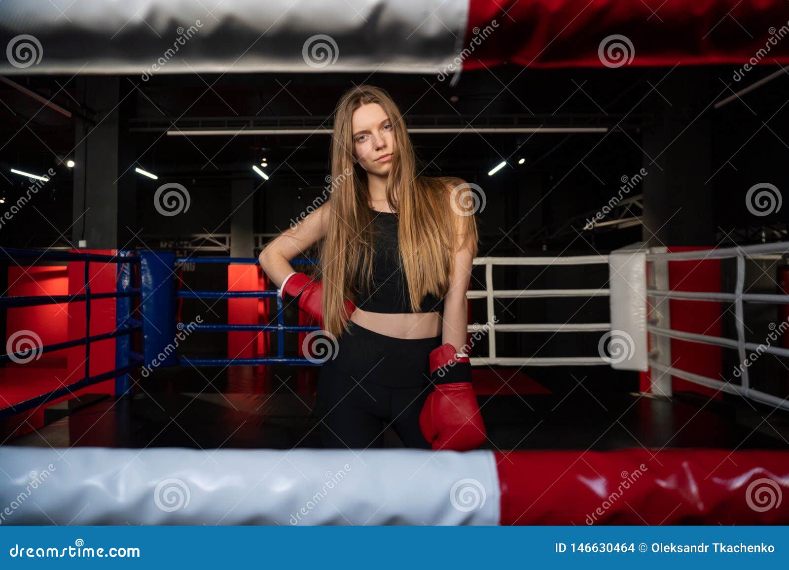 Blonde Caucasian Fighter Girl in Red Boxing Gloves is Posing on Fight ...
