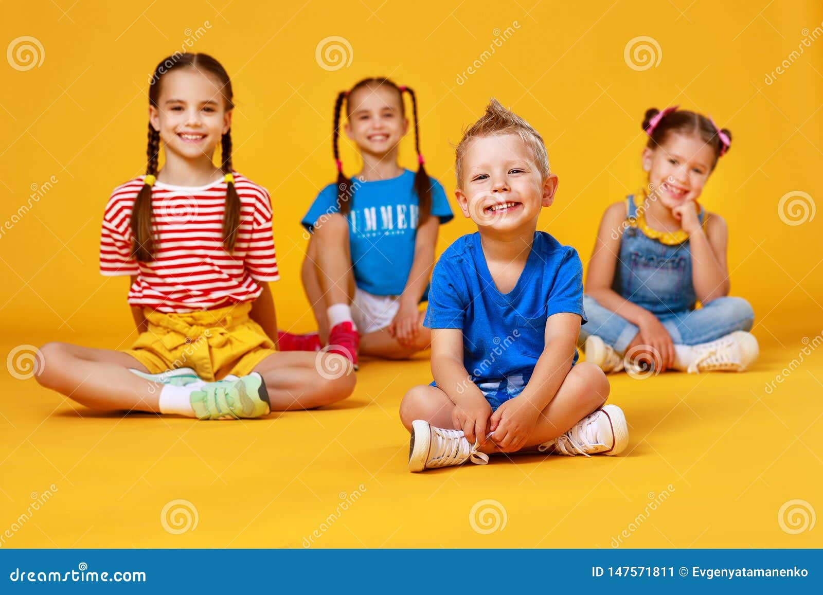 Group of Cheerful Happy Children on Colored Yellow Background 库存图片 - 图片 ...